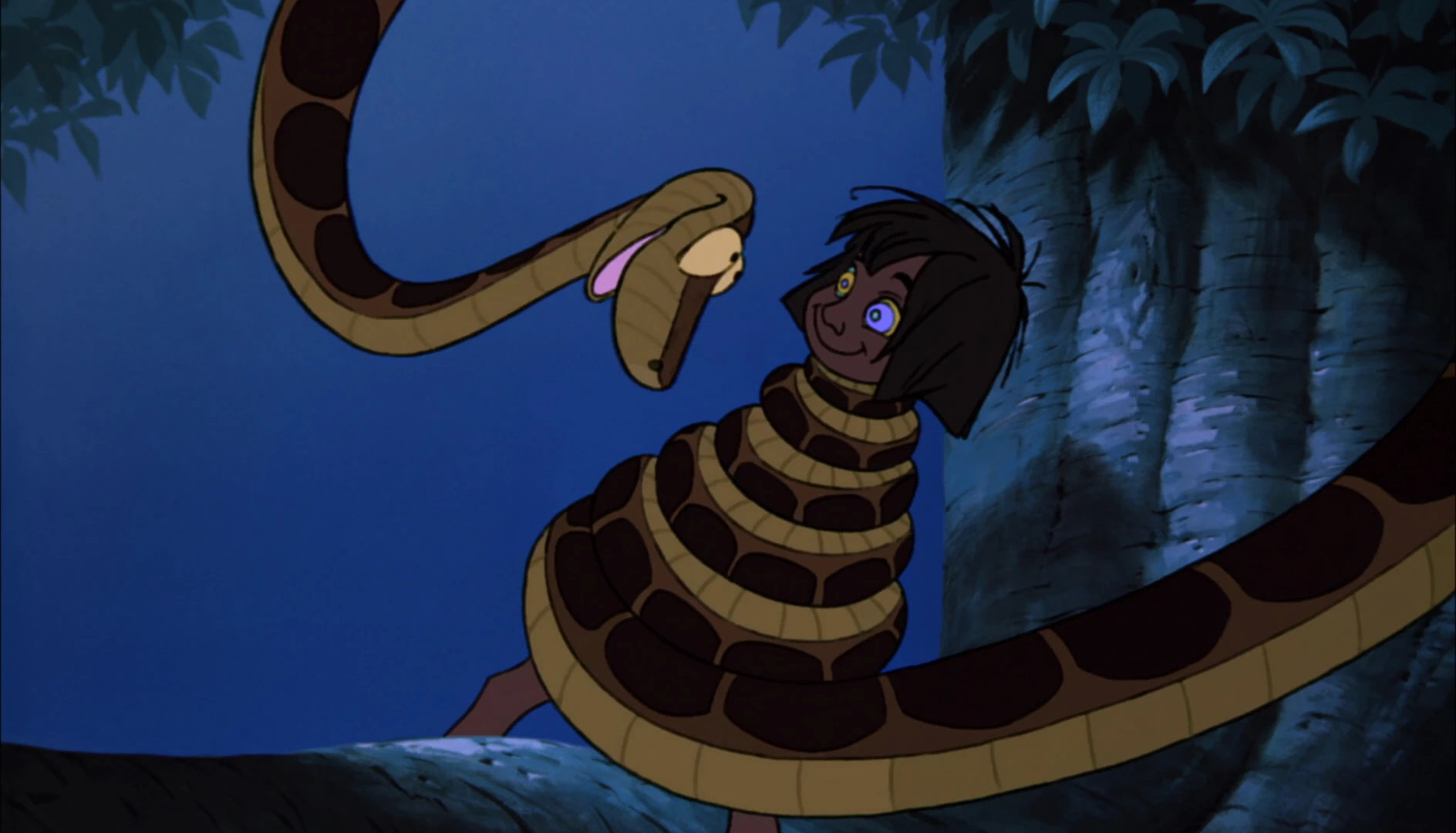 Image - Mowgli is being hypnotized and is wraped up in Kaa the python's ...