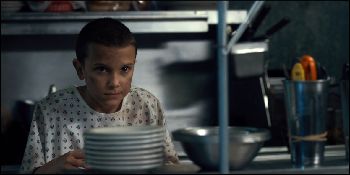 Image - Ep1-Eleven eating fries.png | Stranger Things Wiki | FANDOM ...