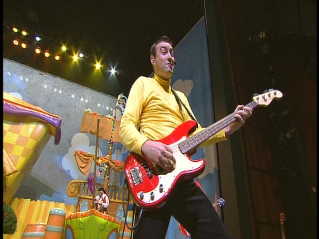 Image - GregPlayingRedFenderBassGuitar.jpg | Wigglepedia | FANDOM ...